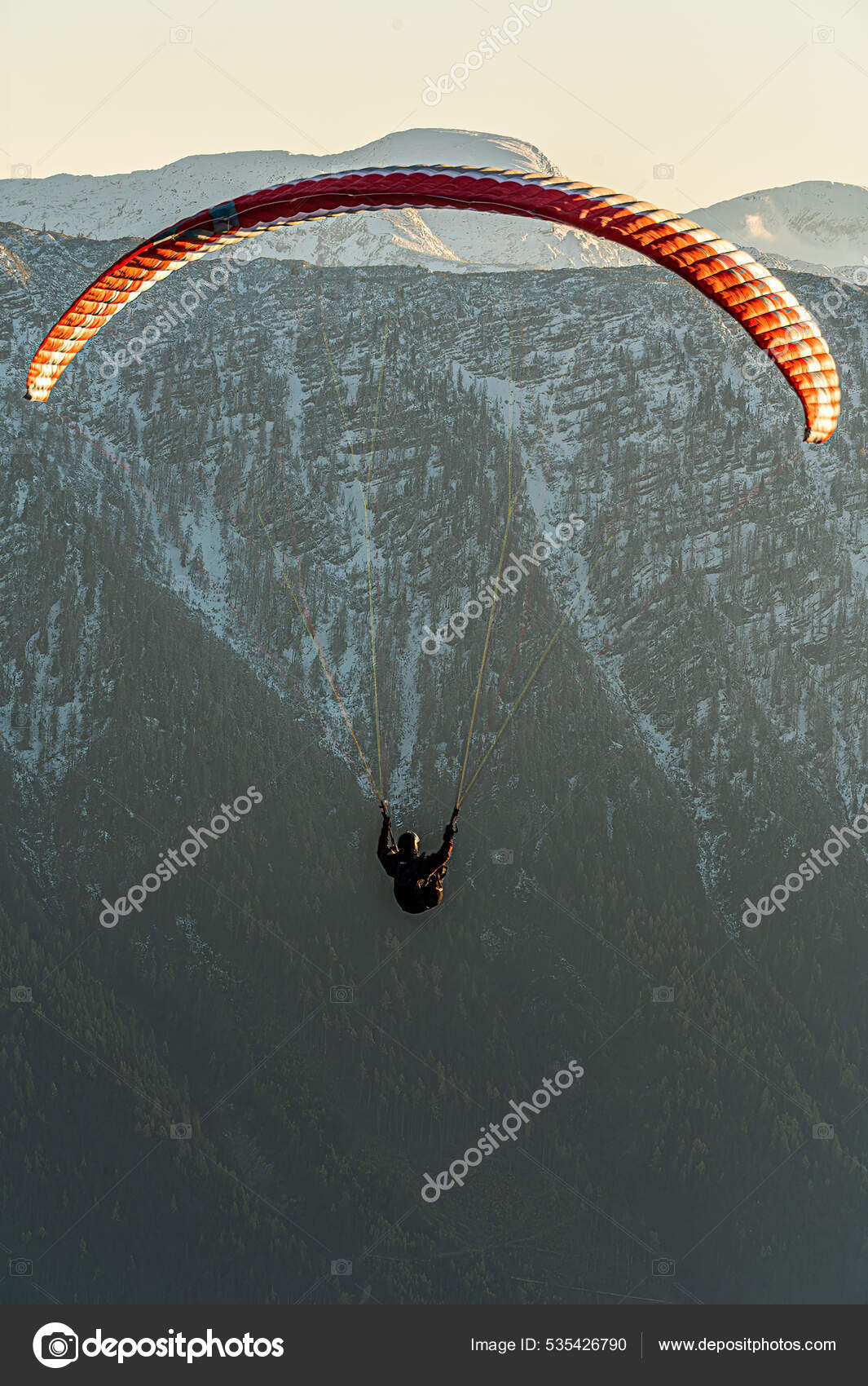 Vertical Shot Paraglider Flying Mountain Background Covered Snow ...