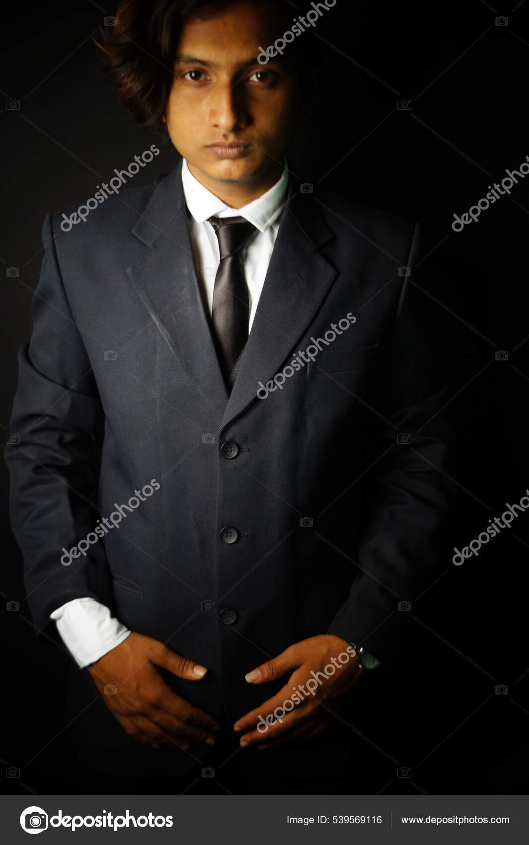 Handsome Man Wearing Black Suit Tie — Stock Photo © Wirestock #539569116