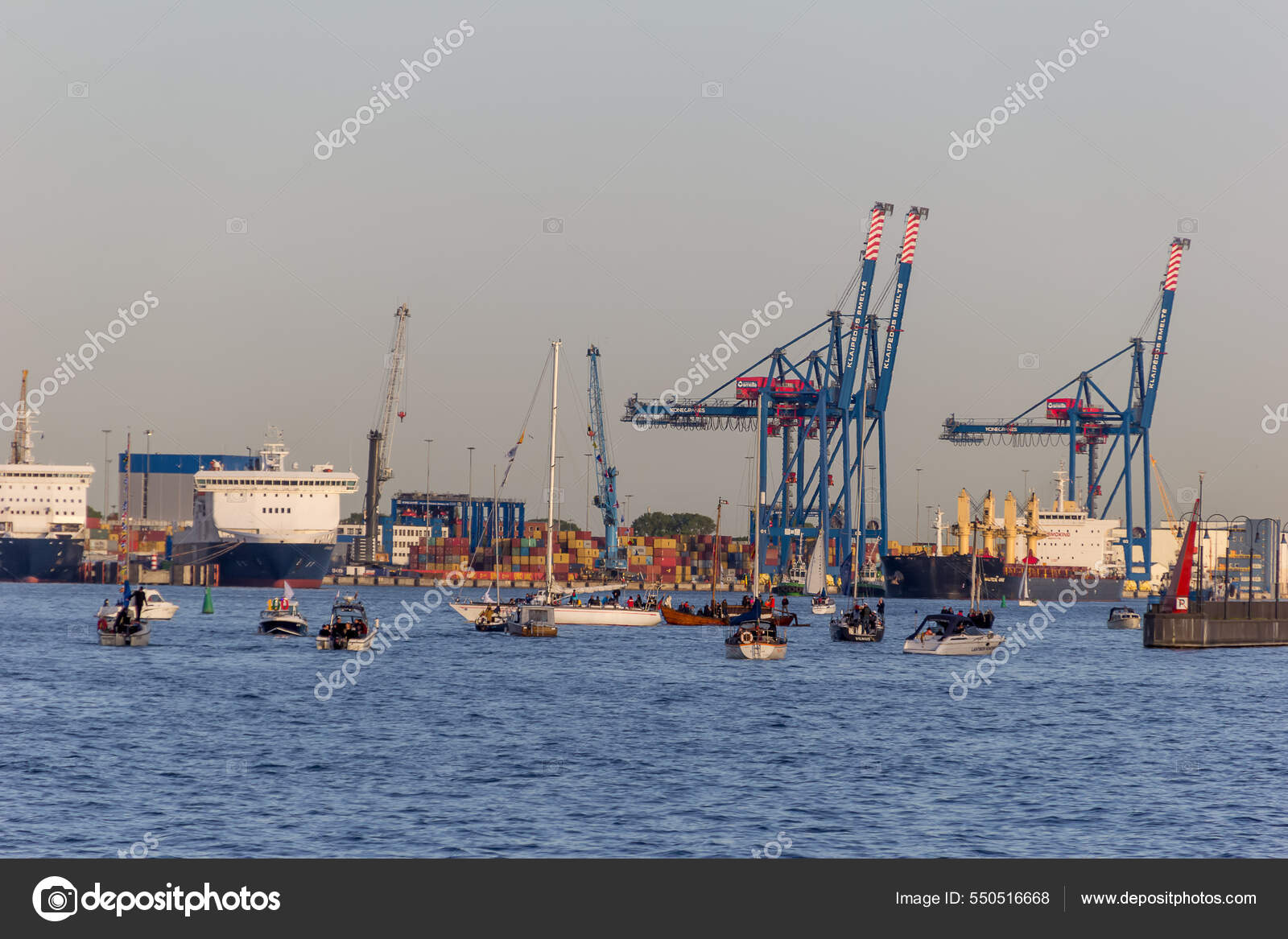 Cargo Ships Seaport – Stock Editorial Photo © Wirestock #550516668
