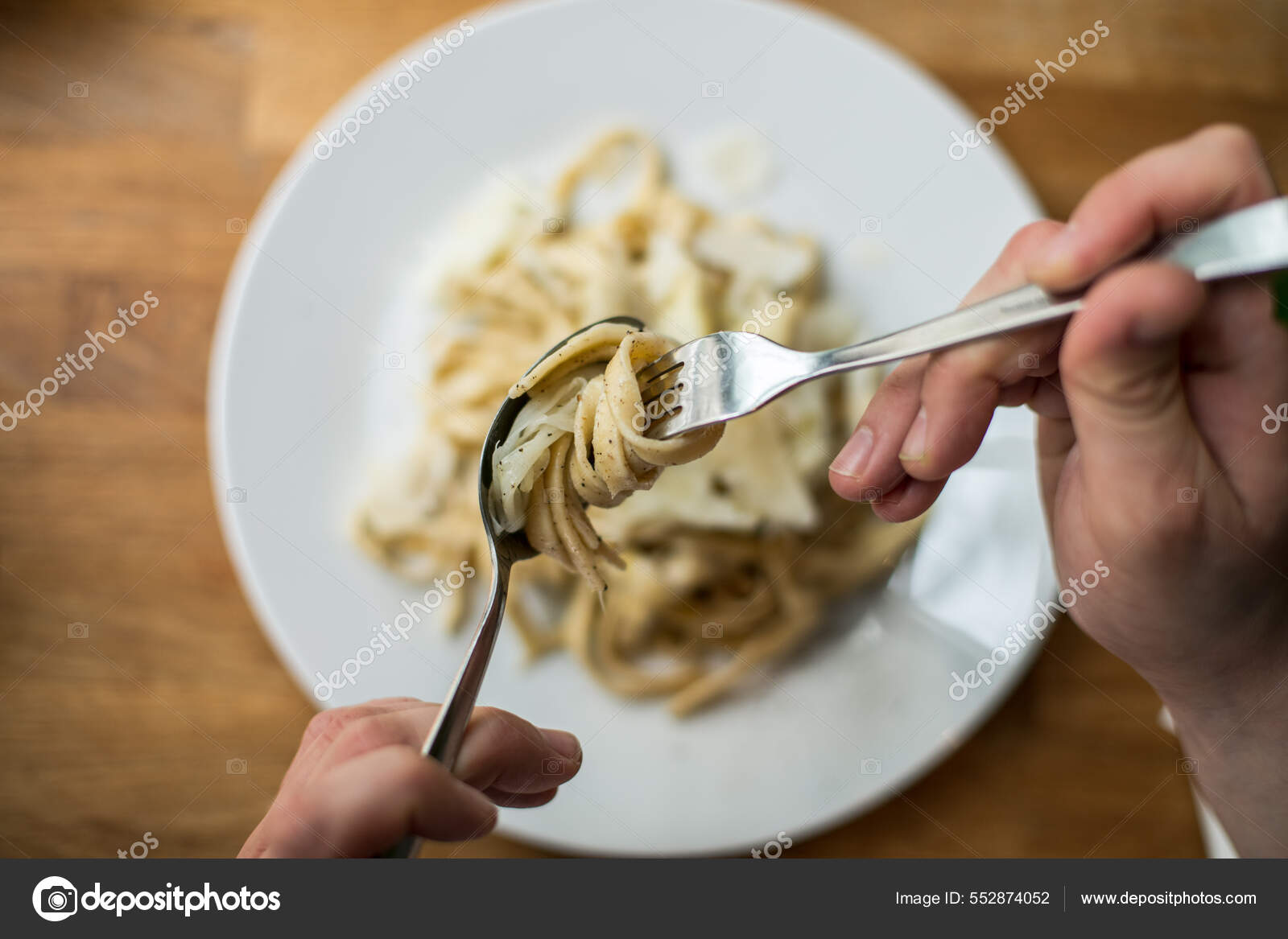 Woman Eating Pasta Fork Spoon Wooden Table — Stock Photo © Wirestock ...