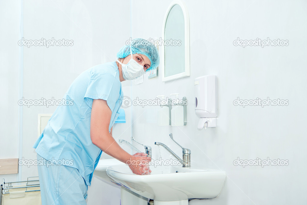 Surgeon washing hands before operation Stock Photo by ©nata-lunataD ...