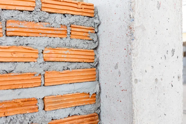 Brick wall construction for house building - Stock Image - Everypixel