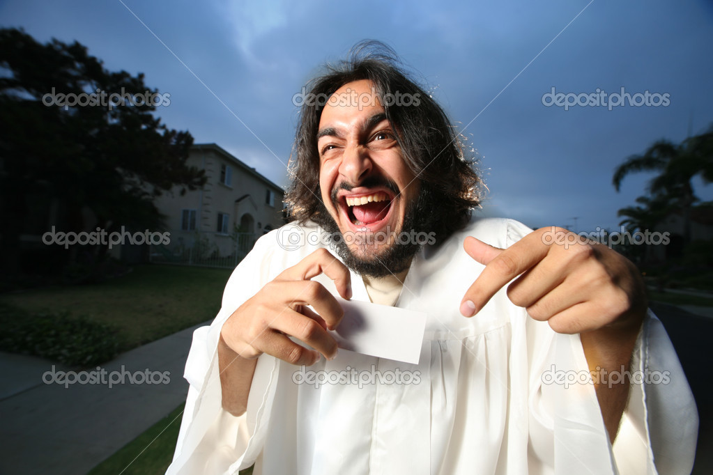 Crazy looking man shownig a blank business card. Stock Photo by ...