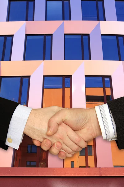 Shaking hands building Stock Photos, Royalty Free Shaking hands ...