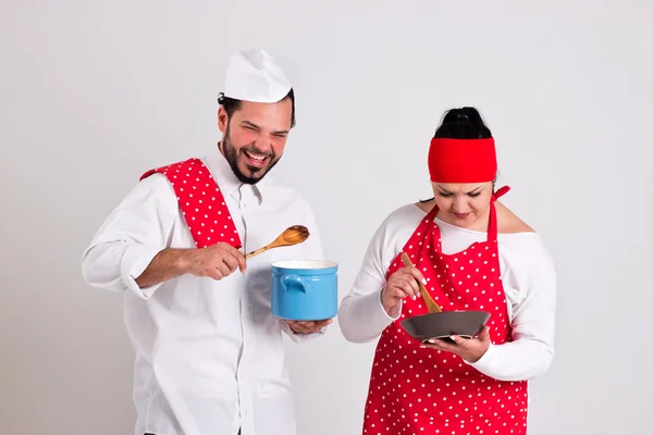 Smiling Italian Chief cook and Cooky are Preparing Chocolate Topp ...