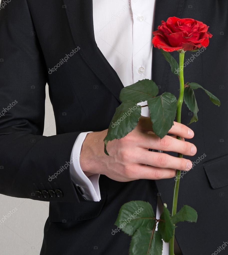 La mano del hombre con una rosa: fotografía de stock © alla_iatsun ...