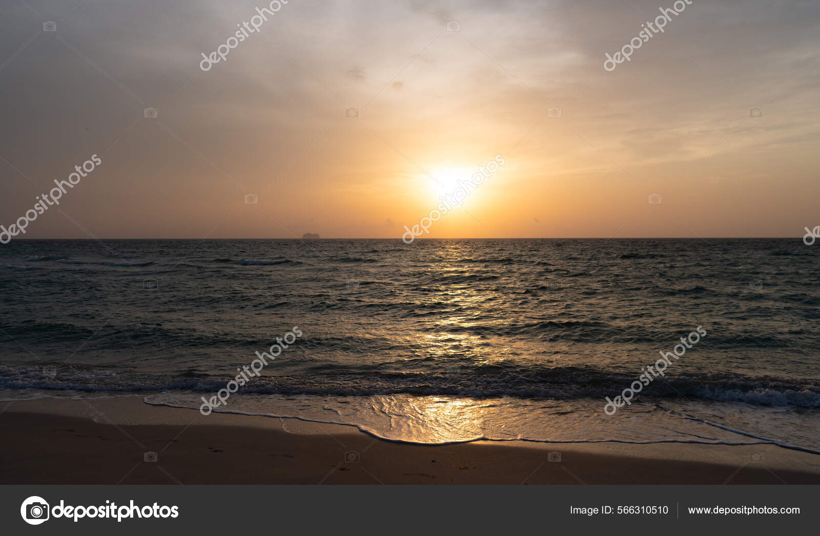 Beautiful sundown sky with waves on sea water Stock Photo by ©stetsik ...