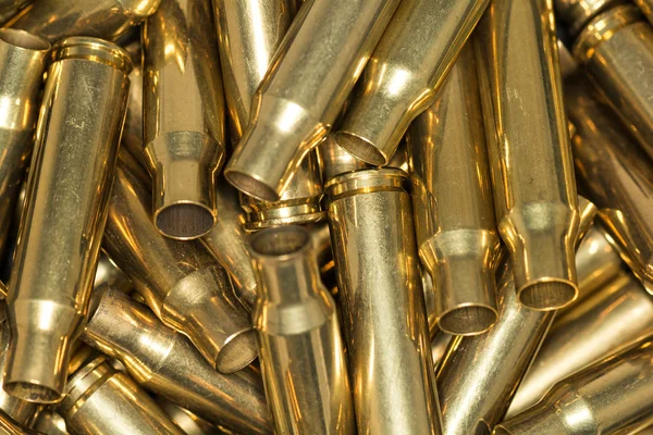 Pile of empty bullet shells Stock Photo by ©yanmingzhang 35760103
