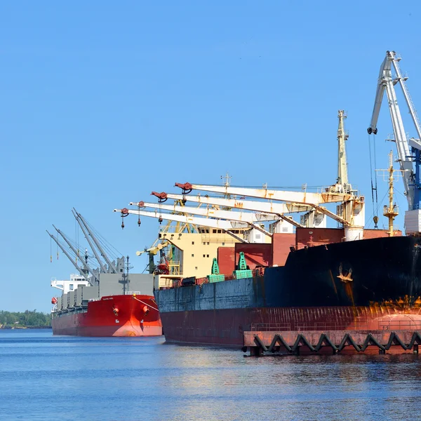 Cargo ships loading in cargo terminal — Stock Photo © alex.stemmer ...
