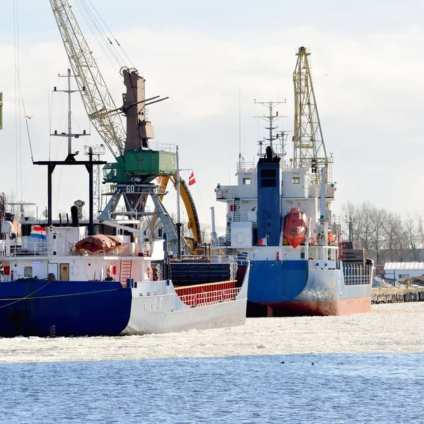 Cargo ships loading in port — Stock Photo © alex.stemmer #32833673
