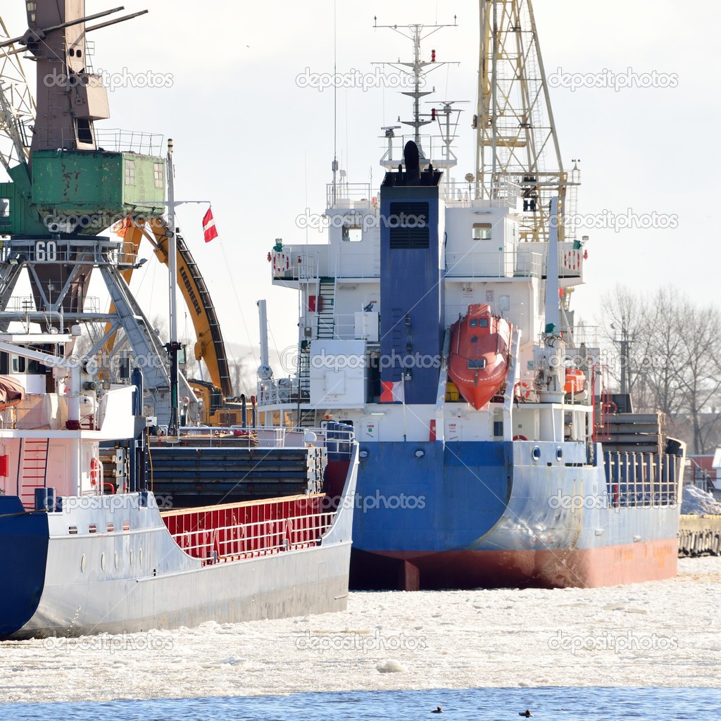 Cargo ships loading in port — Stock Photo © alex.stemmer #32833673