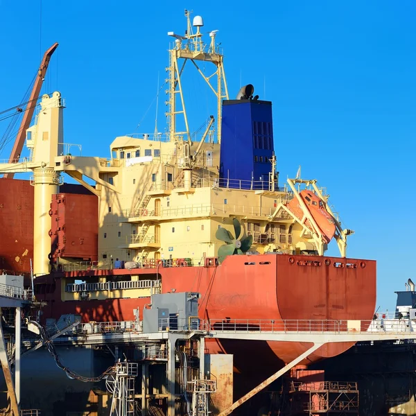 Cargo ship during fixing and painting Stock Photo by ©alex.stemmer 42688429