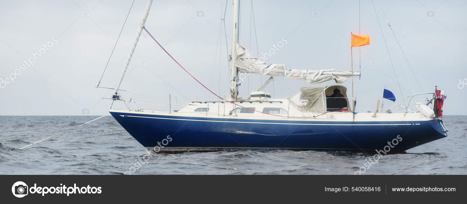 Blue Sloop Rigged Yacht Anchored Coast England Dark Sky Thunderstorm ... Blue Sloop Rigged Yacht Anchored Coast England Dark Sky Thunderstorm ...