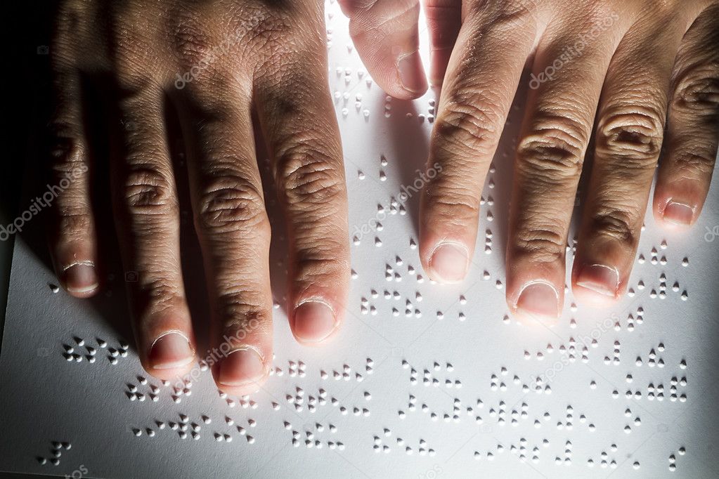 Blind reading text in braille language Stock Photo by ©vverve 41253763