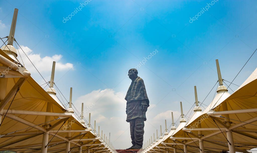 statue of unity the world tallest statue with bright dramatic sky at day from different angle ...