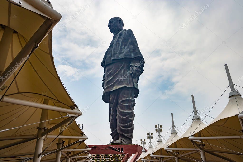 statue of unity the world tallest statue with bright dramatic sky at day from different angle ...