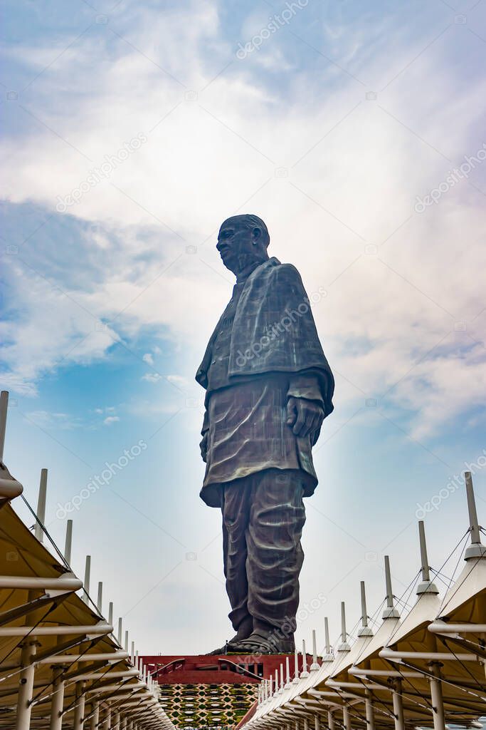 statue of unity the world tallest statue with bright dramatic sky at day from different angle ...