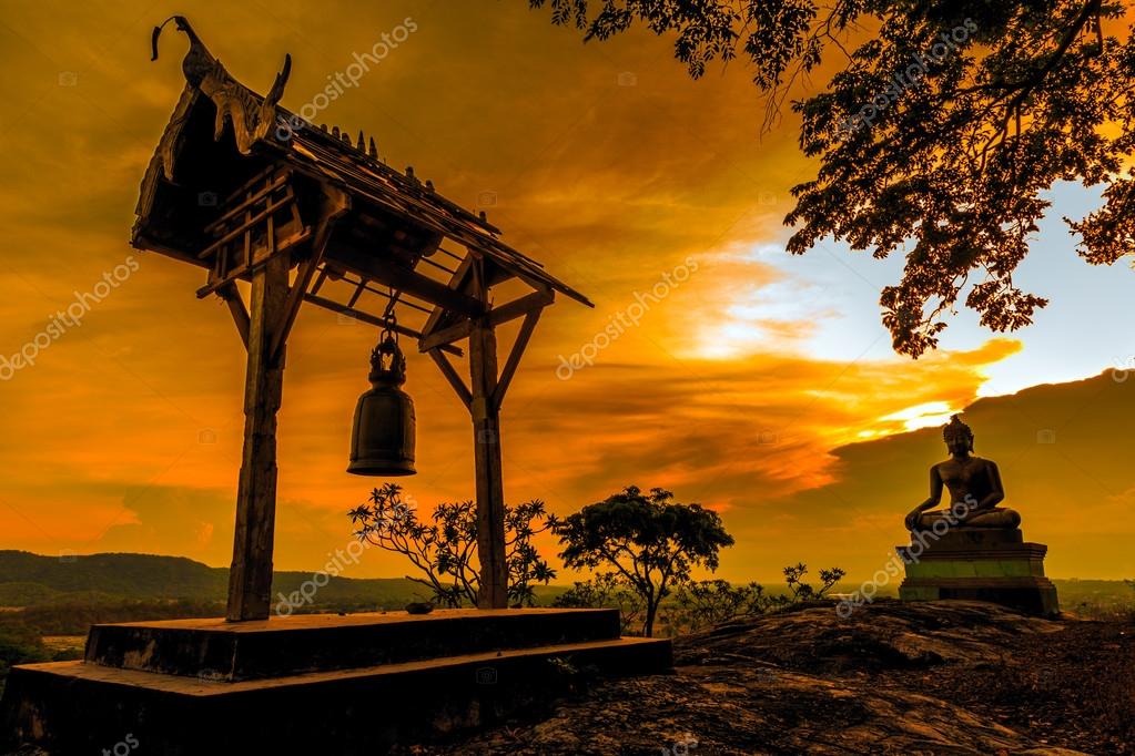 Buddha statue at sunset — Stock Photo © Santiphotodp #47607445