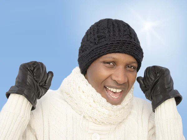 Man facing the cold during a sunny winter day - Stock Image - Everypixel