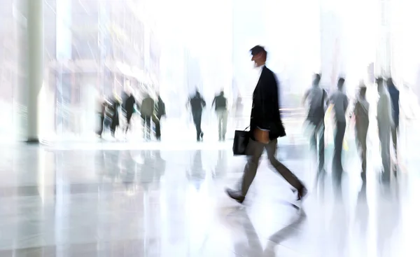 Group of people in the lobby business center Stock Photo by ©blurAZ1 ...