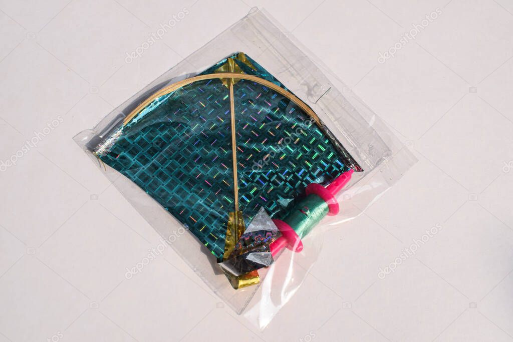 Kite with spool on white background. Kite festival makarsankranti ...