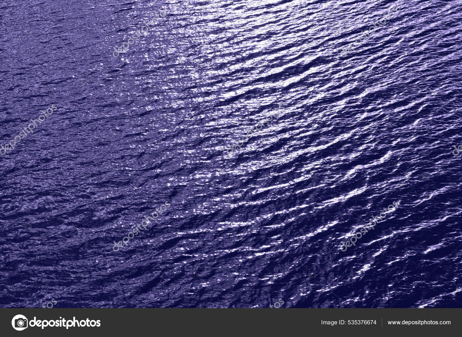 Very peri toned sea water texture. Pool water with sun reflections ...