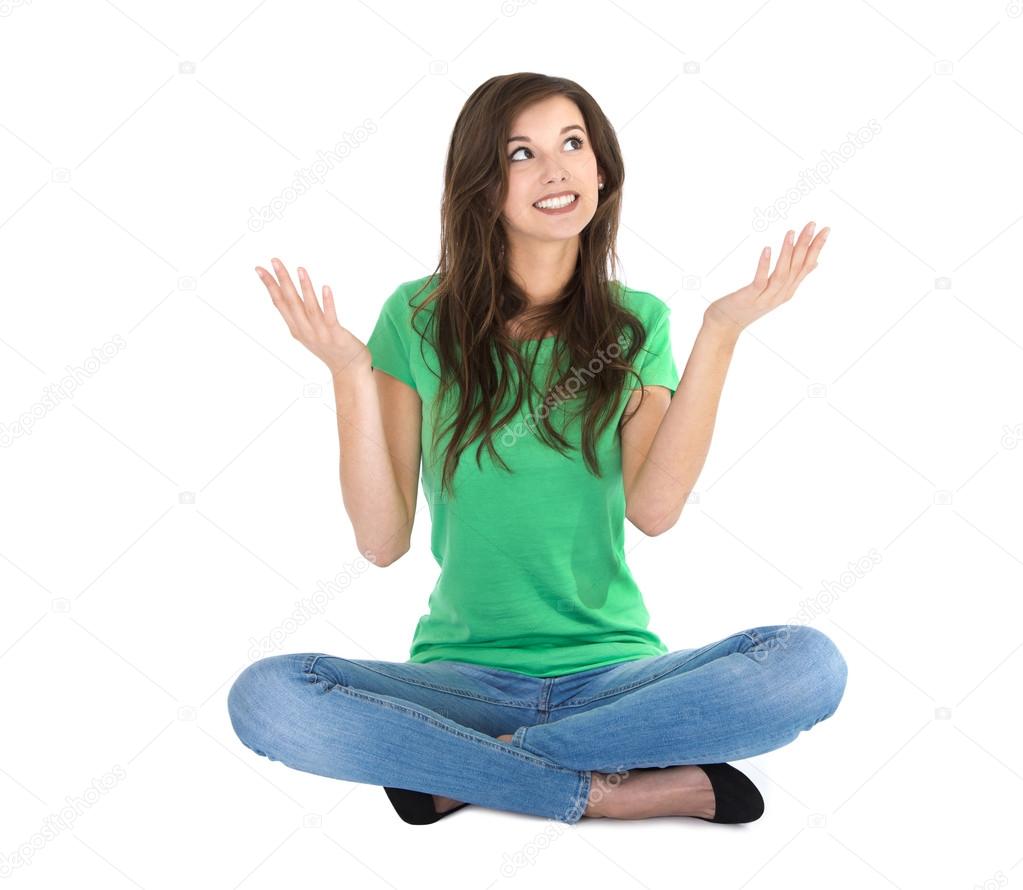 Isolated woman with inquiringly view sitting with crossed legs. — Stock ...