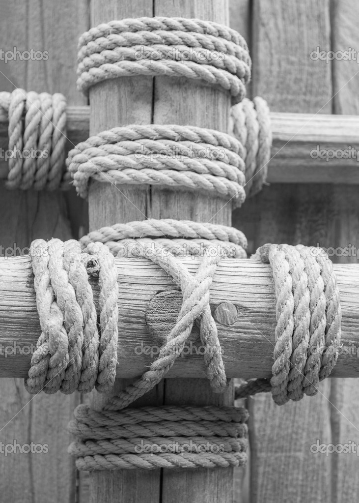 Old wood and old rope — Stock Photo © binik1 #41011459