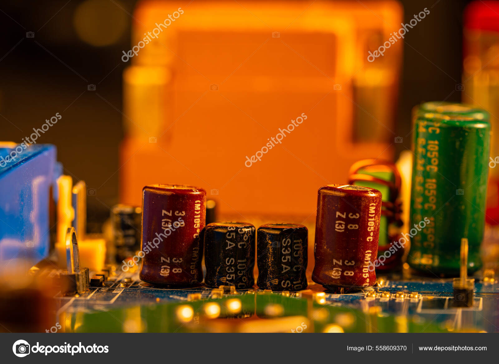 Motherboard with electronic components. Transistors capacitors ...