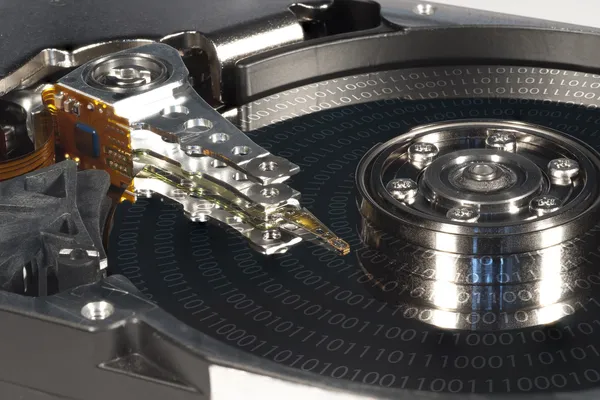Hard drive with binary codes on the disk — Stock Photo © a4ndreas #35492877