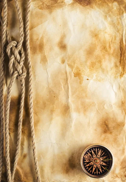 Compass on the old paper background Stock Photo by ©ulkan 34866061