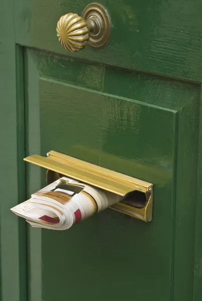Newspaper door Stock Photos, Royalty Free Newspaper door Images ...
