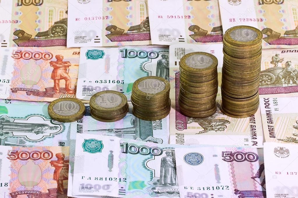 10 rubles coins on banknote money background Stock Photo by ©mars58 ...