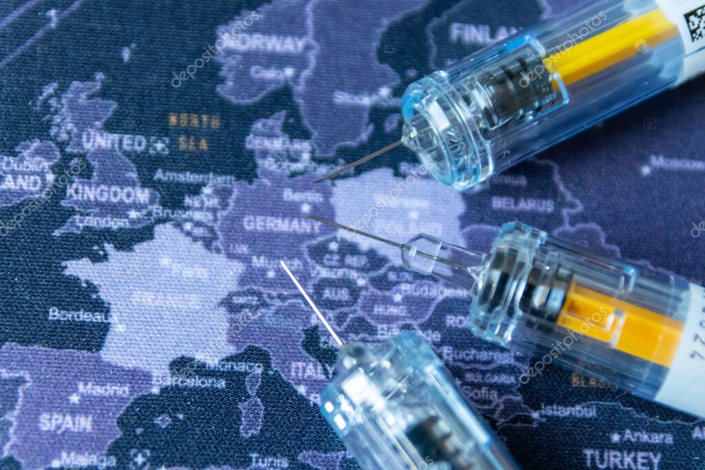 New medical vaccines ready for injection with syringe and vaccine to ...