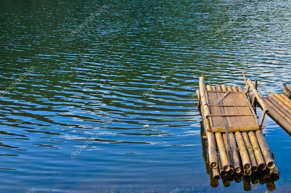 Bamboo raft floating on blue calm water in Pang-oong reserve in — Stock ...