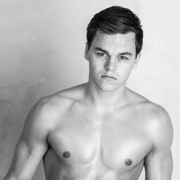 Image of young shredded man against a wall Stock Photo by ©nicolaik ...