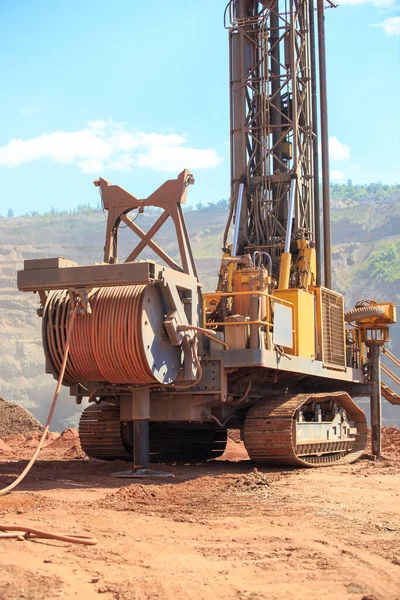 Machine for drilling wells in the quarry. Drilling of boreholes for ...