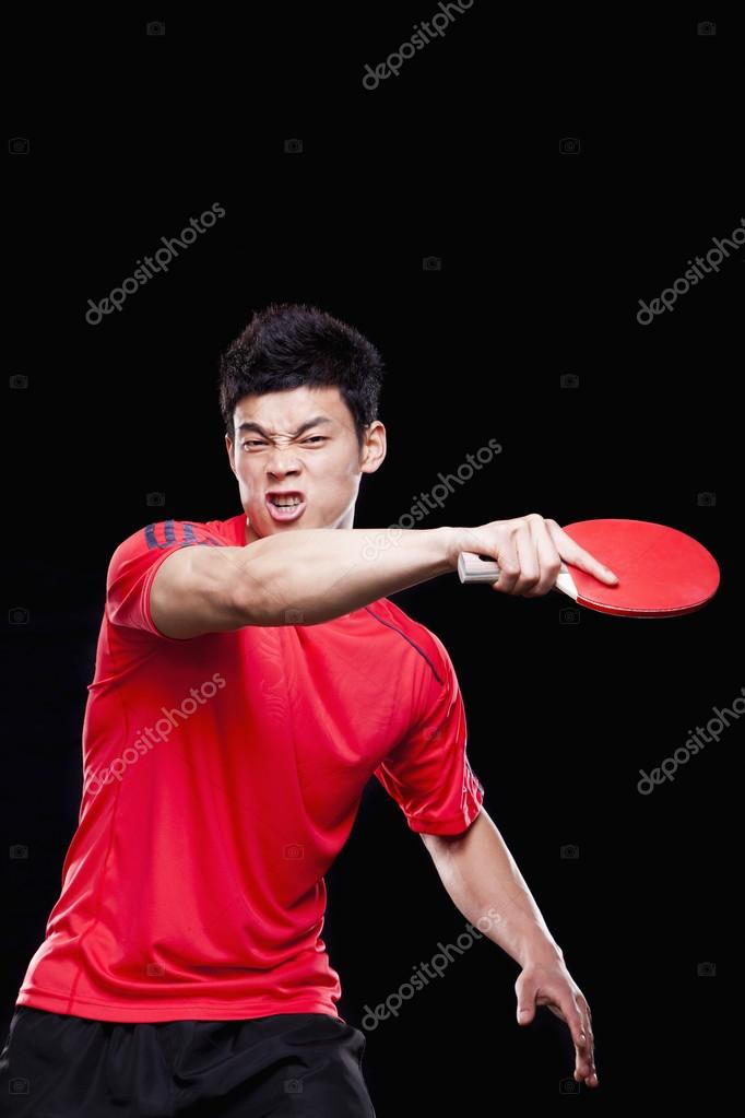 Man playing ping pong — Stock Photo © XiXinXing #36348379