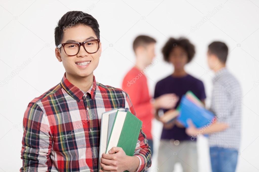 Cheerful Chinese teenage boy — Stock Photo © gstockstudio #38454325 Cheerful Chinese teenage boy — Stock Photo © gstockstudio #38454325