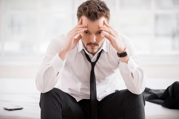 Frustrated young man feeling tired and depressed - Stock Image - Everypixel