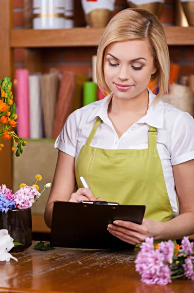 Beautiful florist at work. - Stock Image - Everypixel