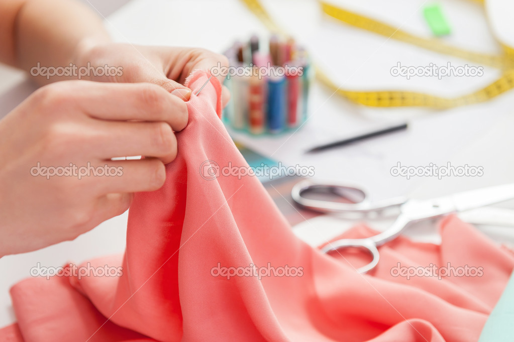Tailor sewing. Stock Photo by ©gstockstudio 45540821