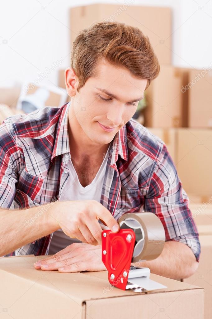 Man packing boxes — Stock Photo © gstockstudio #46554749