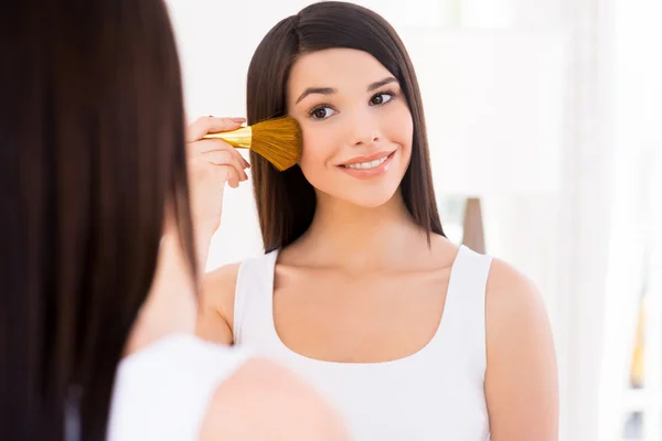 Beautiful young woman doing make-up — Stock Photo © valuavitaly #5455993