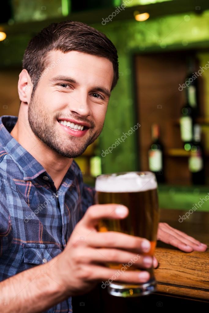 Man toasting with beer Stock Photo by ©gstockstudio 49602787