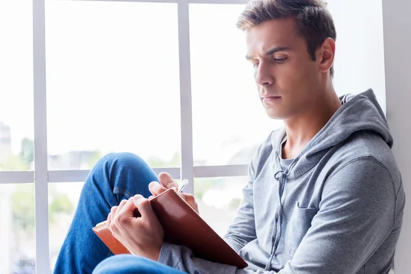 Handsome man writing Stock Photos, Royalty Free Handsome man writing ...