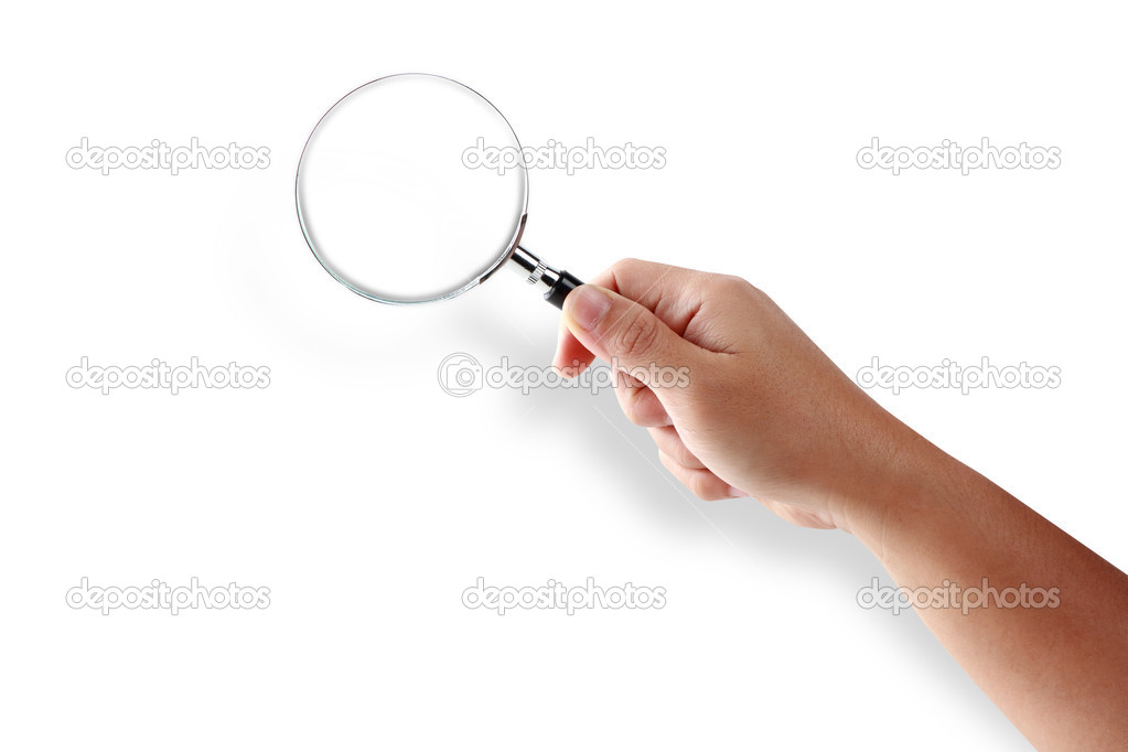 Hand holding magnifying glass Stock Photo by ©koydesign 41478083