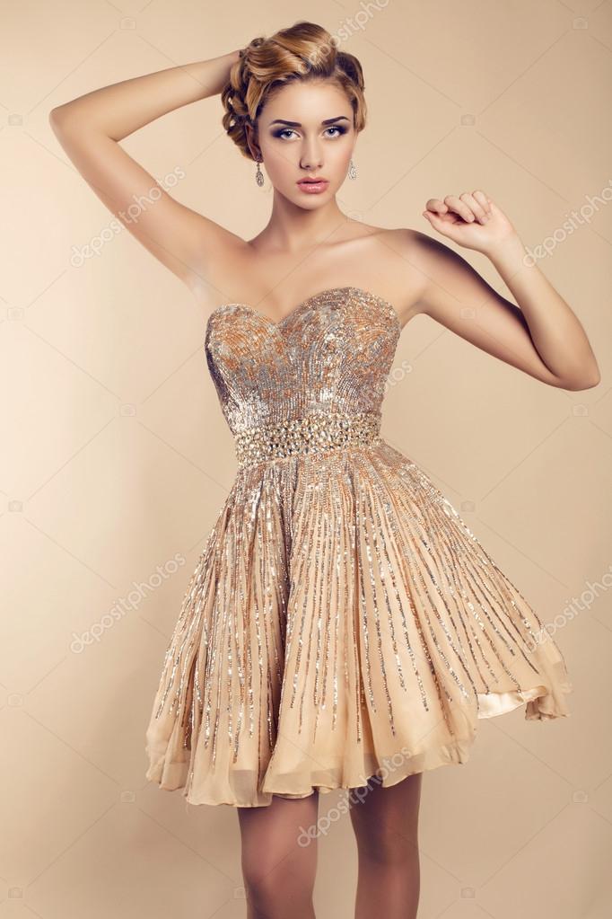 Beautiful blond woman in elegant dress Stock Photo by ©Slava_14 42150557 Beautiful blond woman in elegant dress Stock Photo by ©Slava_14 42150557