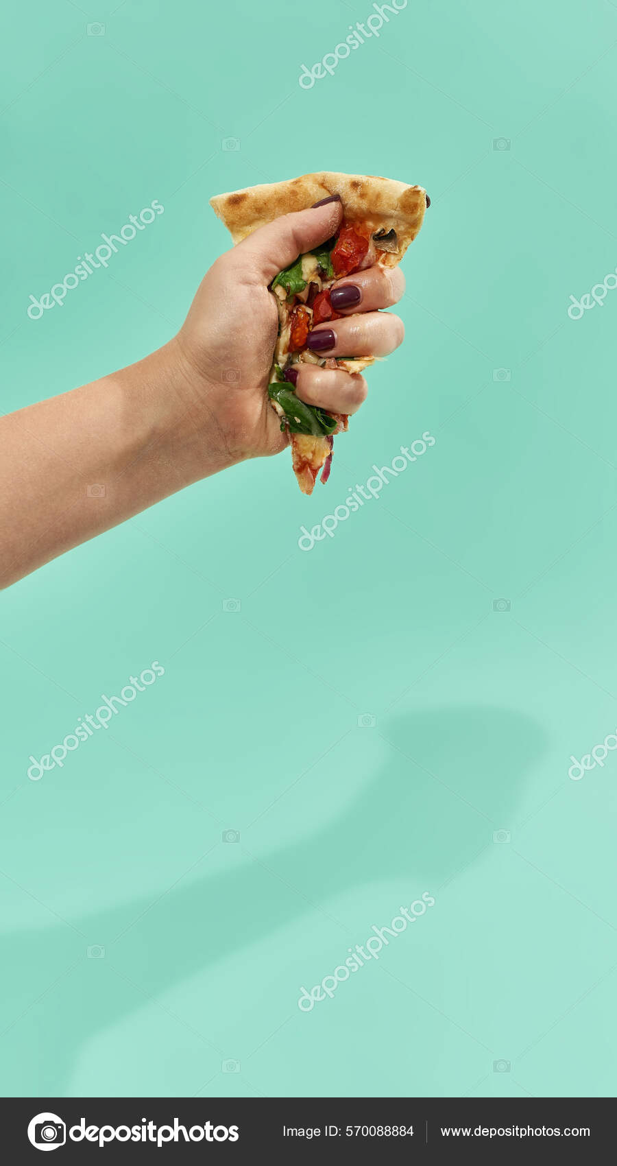 Woman hand squeezing slice of pepperoni pizza Stock Photo by ©LanaStock ...