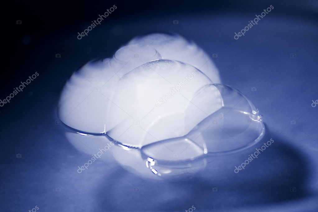 Big soap bubbles on a water surface with smoke inside Stock Photo by ...
